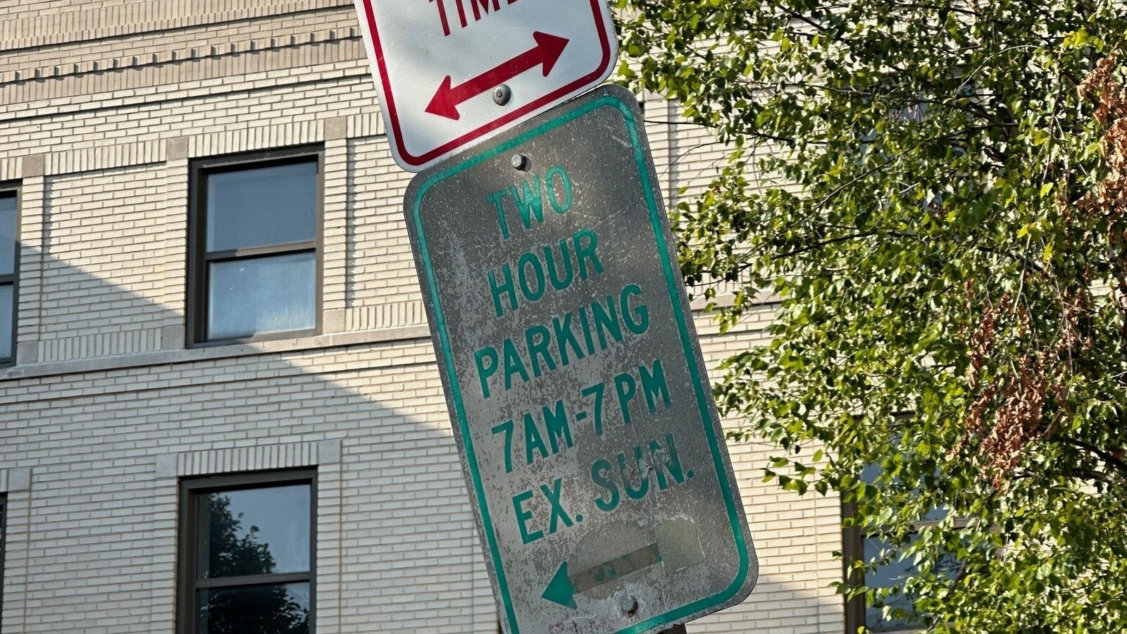 Petition · Replace the Conflicting and Confusing Parking Sign at 231 ...